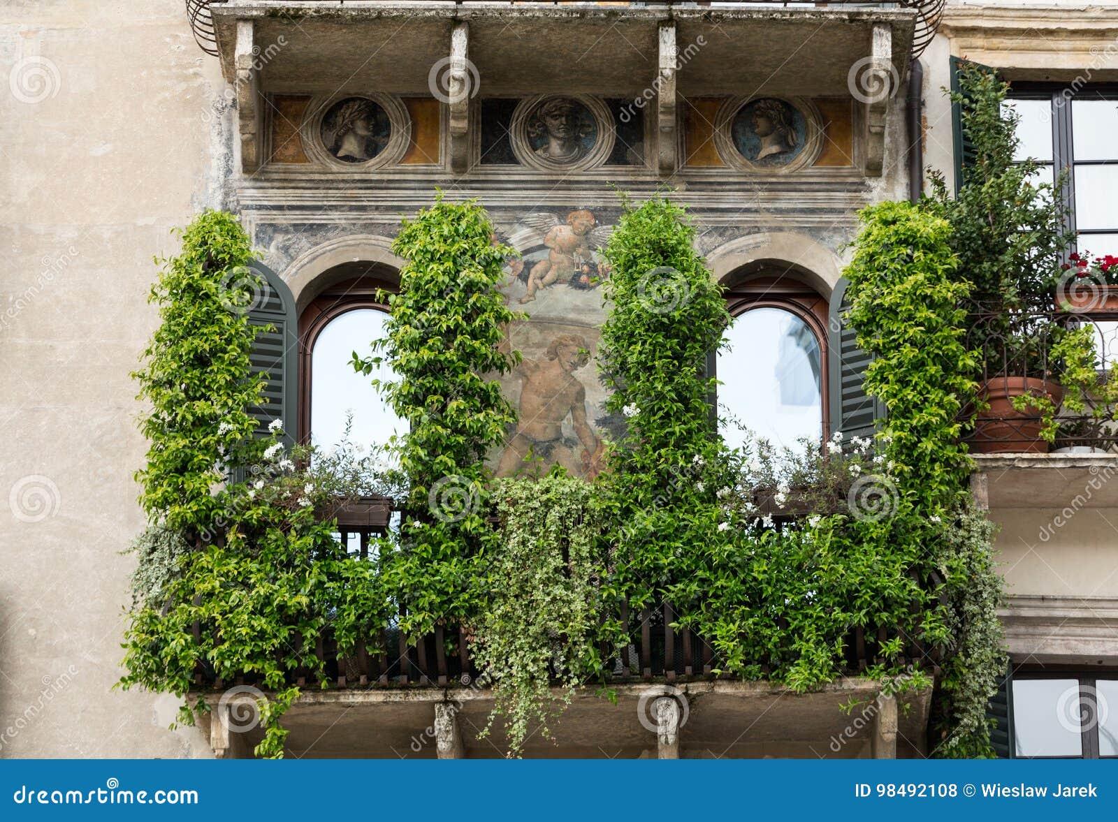 A Fresco Surrounds a Window in Piazza Delle Erbe, Verona. Stock Photo ...
