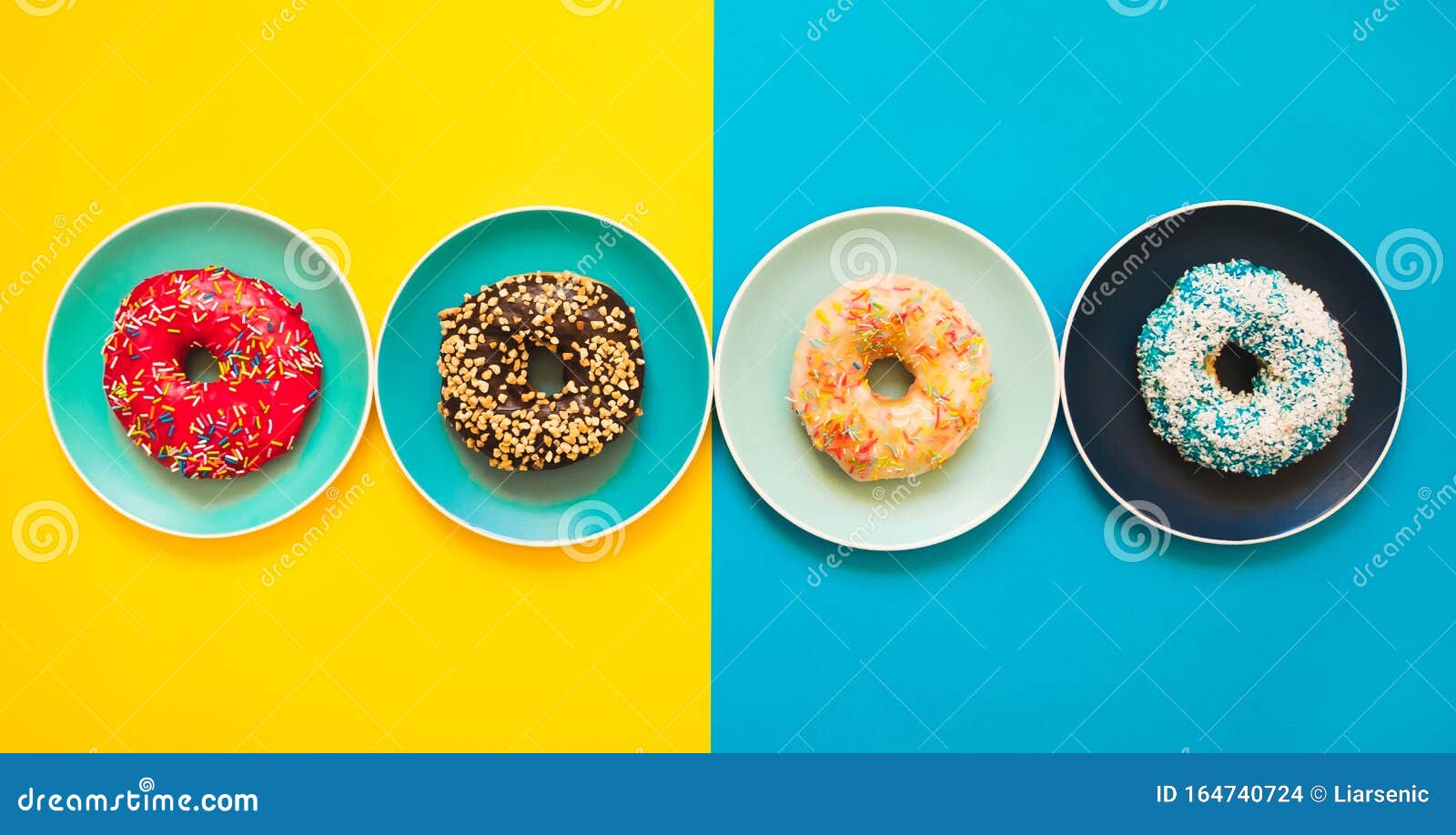 Fresh Appetizing 4 Donuts Lying on Plate in Colored Yellow and Blue ...