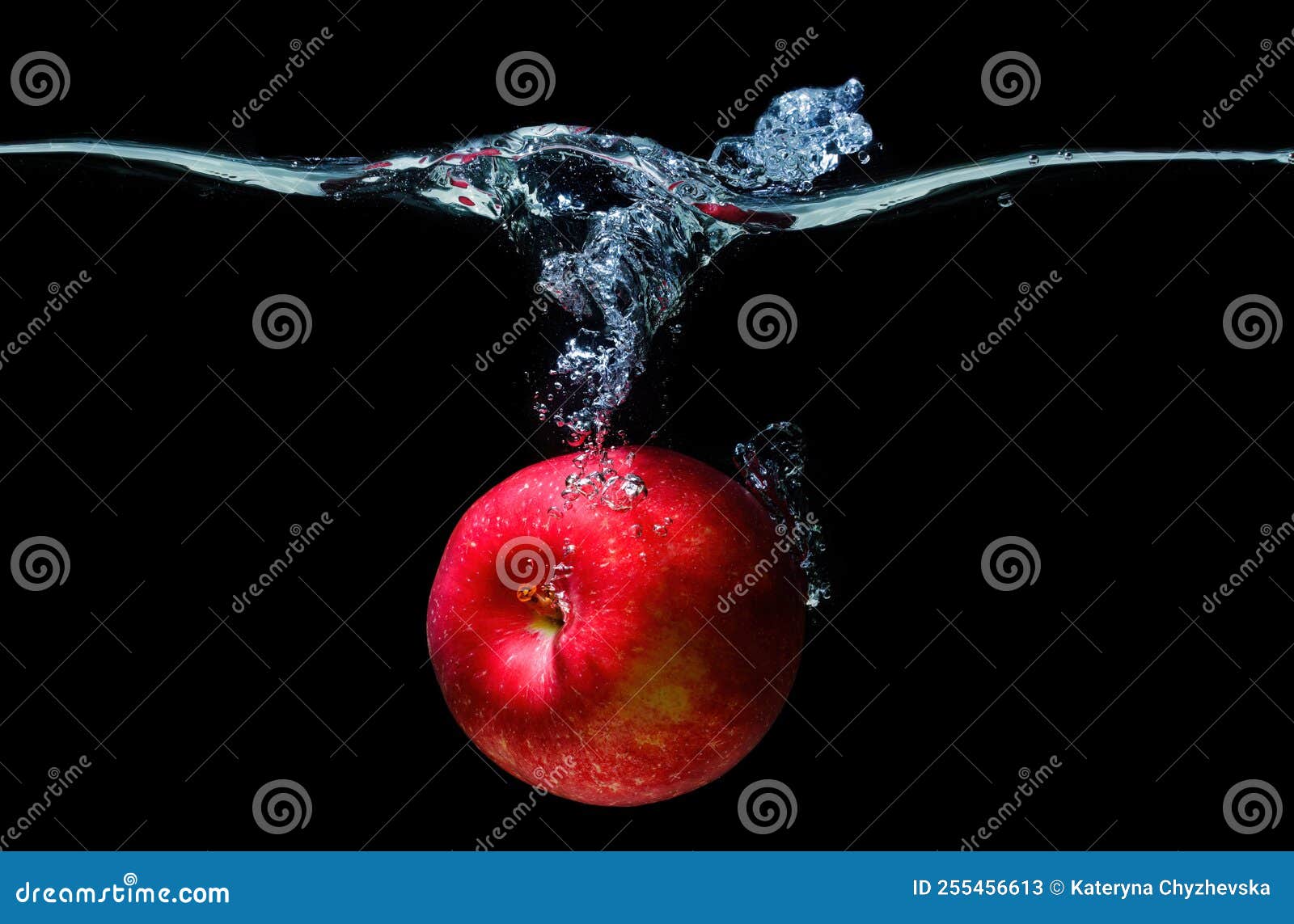 Red Apple Dropped Into Water With Splash Royalty-Free Stock Photography ...