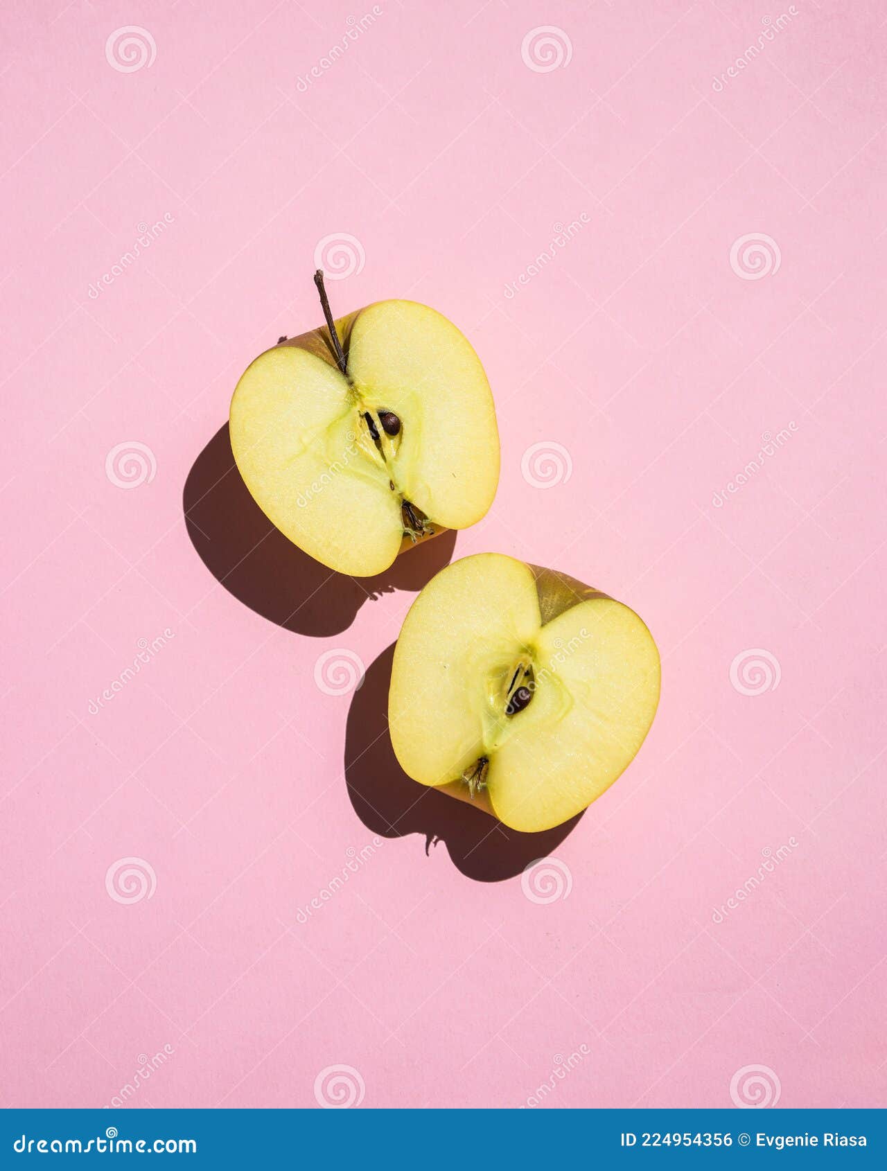 Fresh Apple on a Pink Background. Sliced Apple on a Colored Background ...