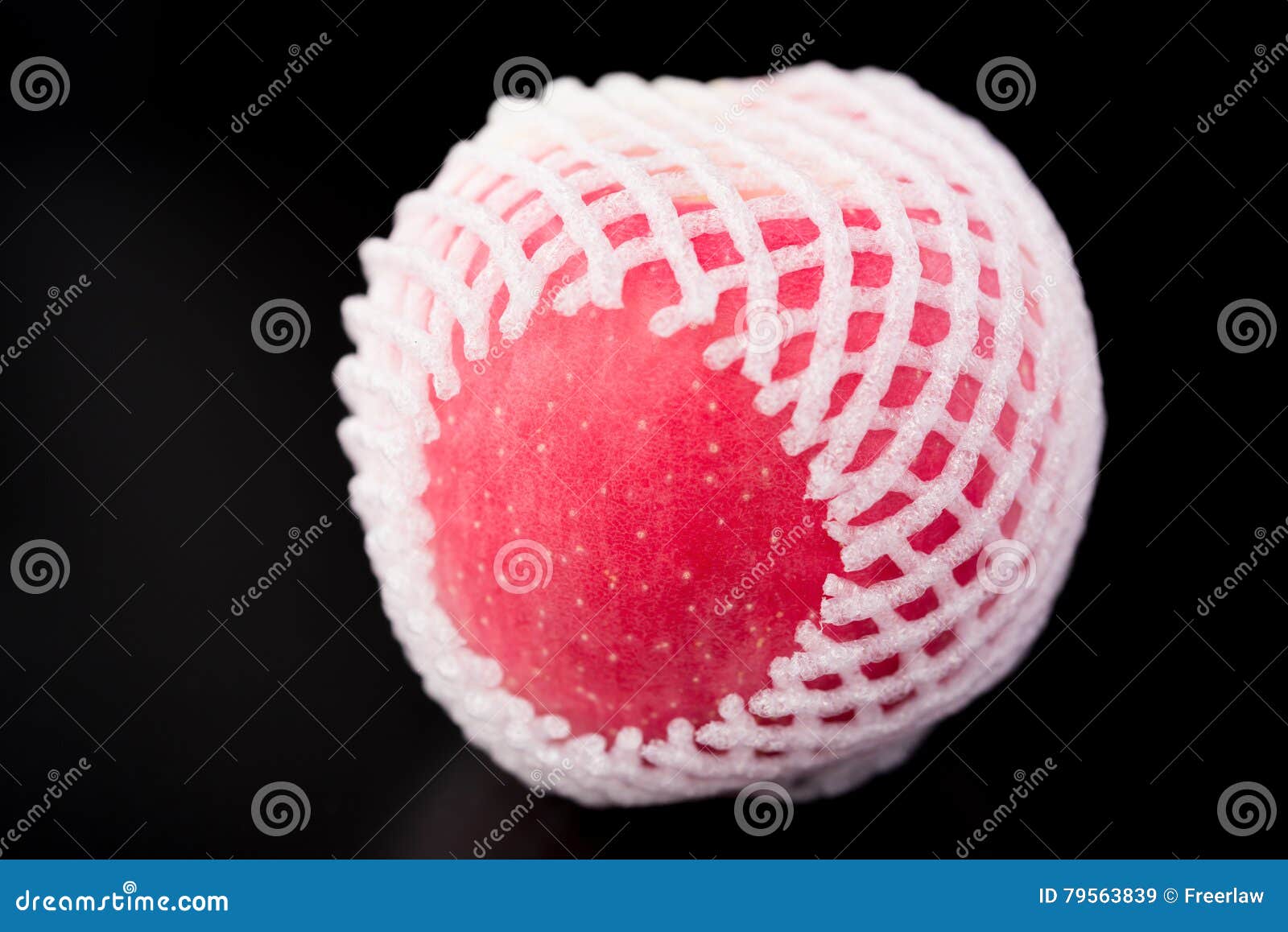 Fresh Apple Wrap with Protective Foam on Black Stock Image - Image of ...