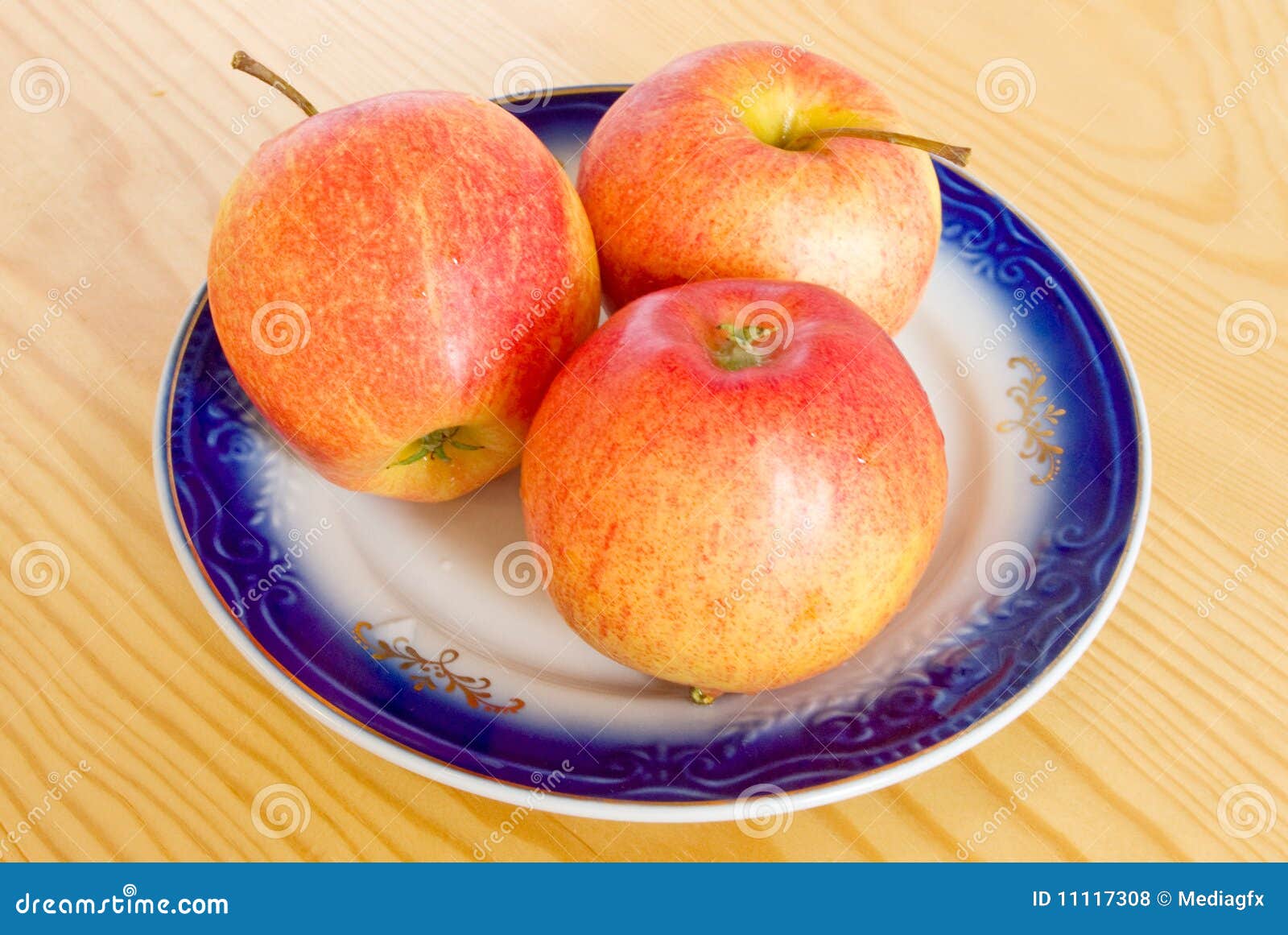 Fresh apples on the plate stock photo. Image of apple - 11117308