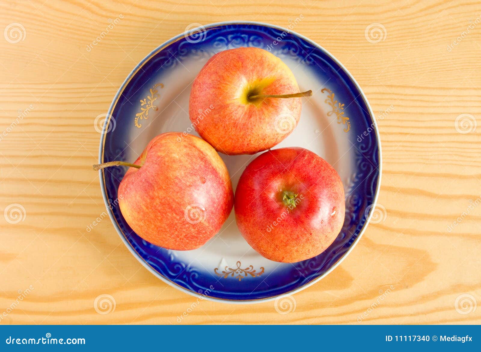 Fresh apples on the plate stock photo. Image of apple - 11117340