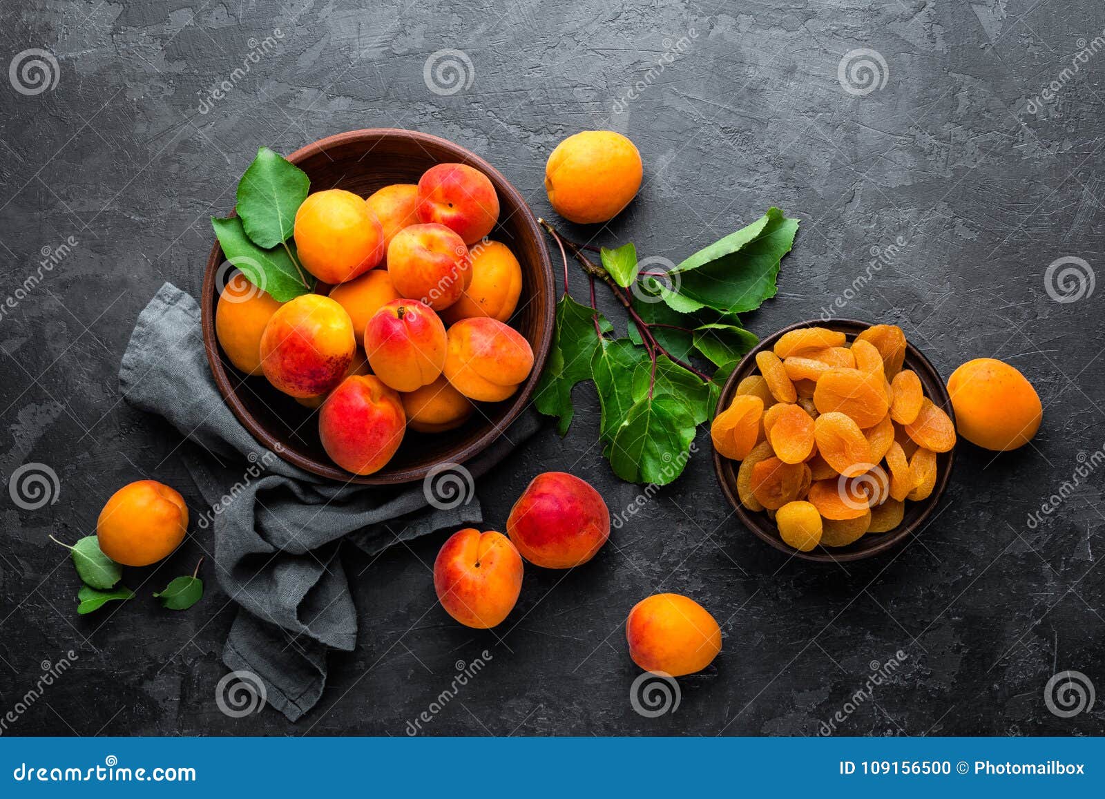 Fresh Apricots with Leaves and Dried in Bowl Stock Photo - Image of ...