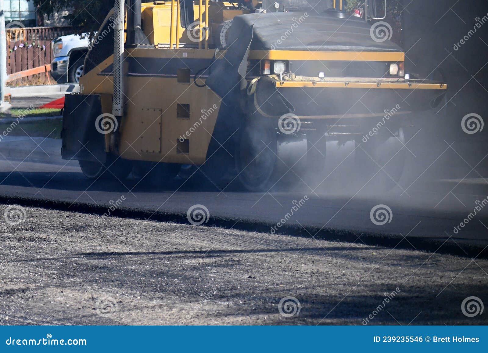 Fresh asphalt being rolled stock photo. Image of asphalt - 239235546