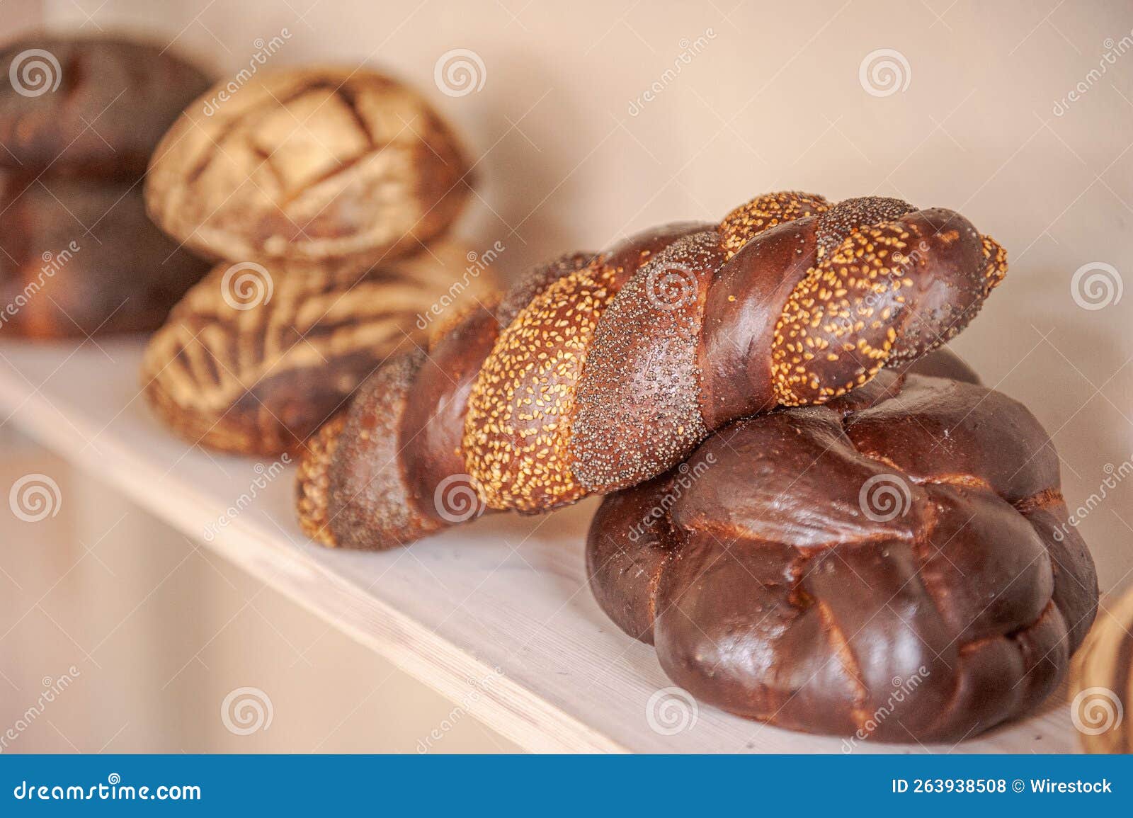 Fresh Assortments of Bread on the Shelf in the Bakery Stock Photo ...