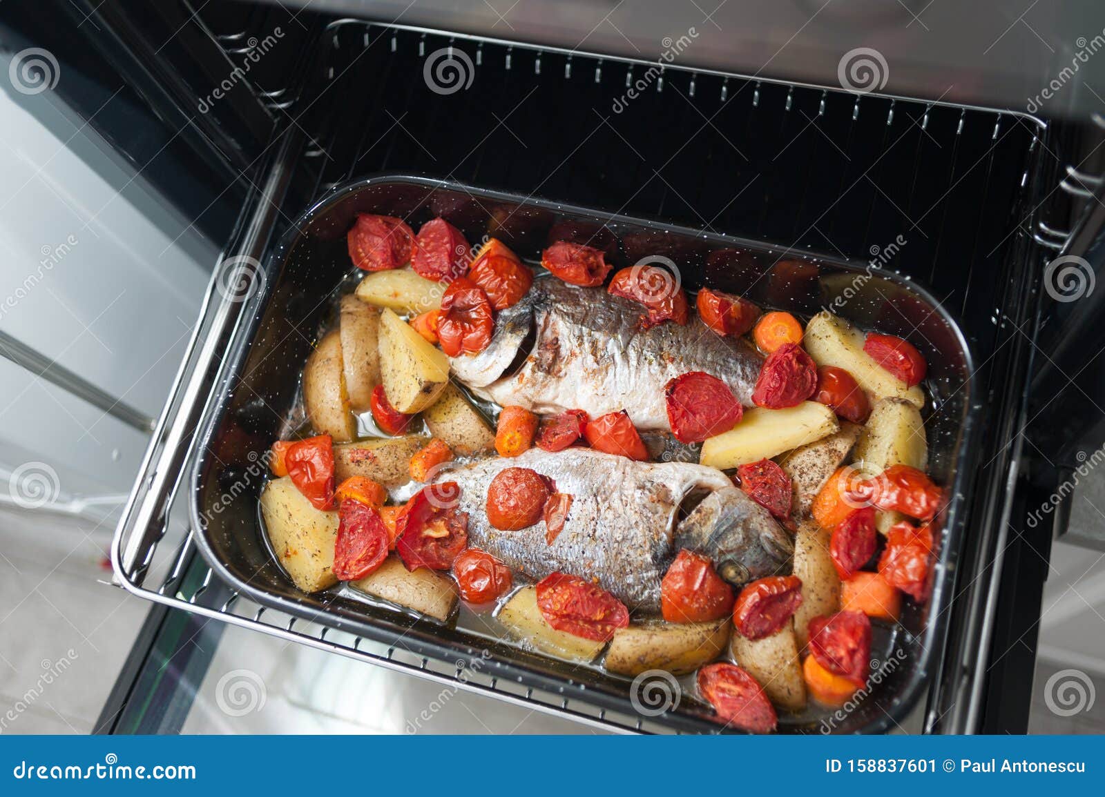 Fresh Baked Fish with Vegetables and Potatoes in Pan Stock Image ...