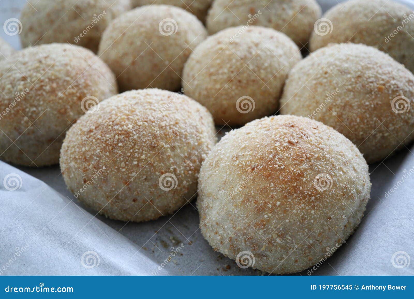 Fresh Baked Pandesal Rolled in Bread Crumbs Close Up. Stock Image ...