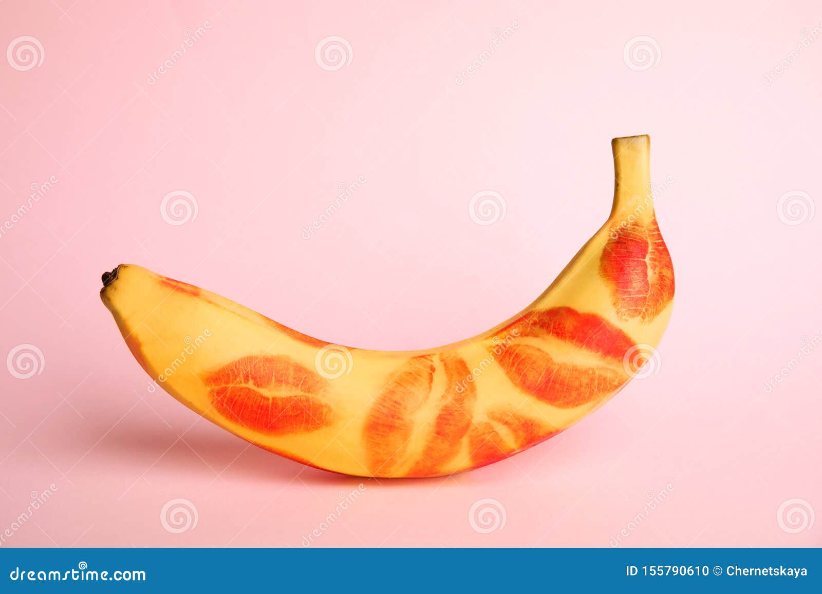 Fresh Banana With Red Lipstick Marks On Pink Oral Sex Concept Stock