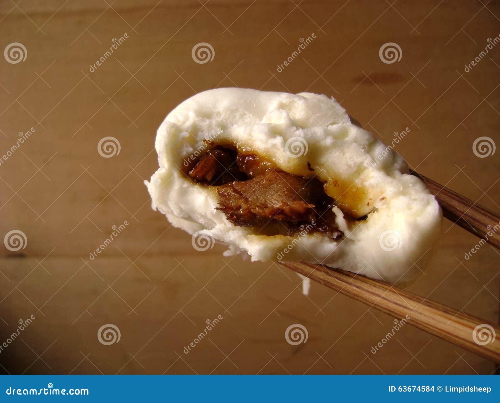 Eating fresh BBQ Pork Buns stock photo. Image of chinese - 63674584