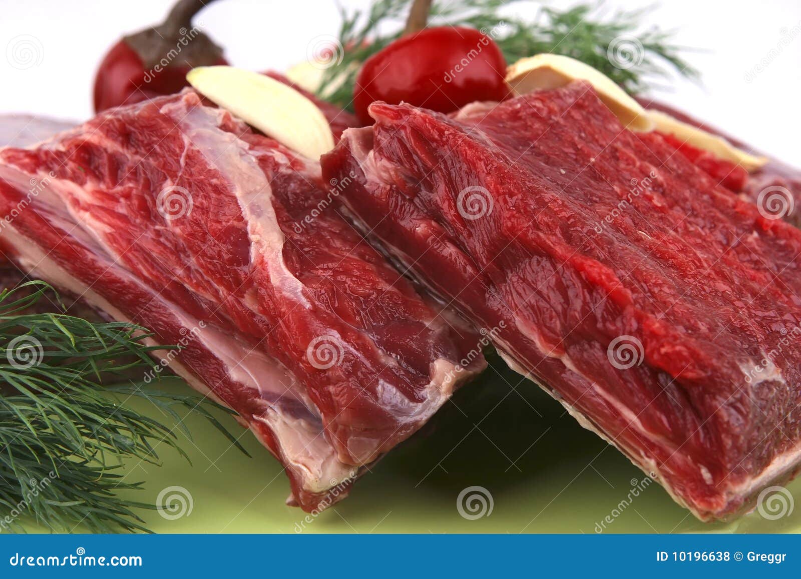 Fresh beef rib s on dish stock photo. Image of plate - 10196638