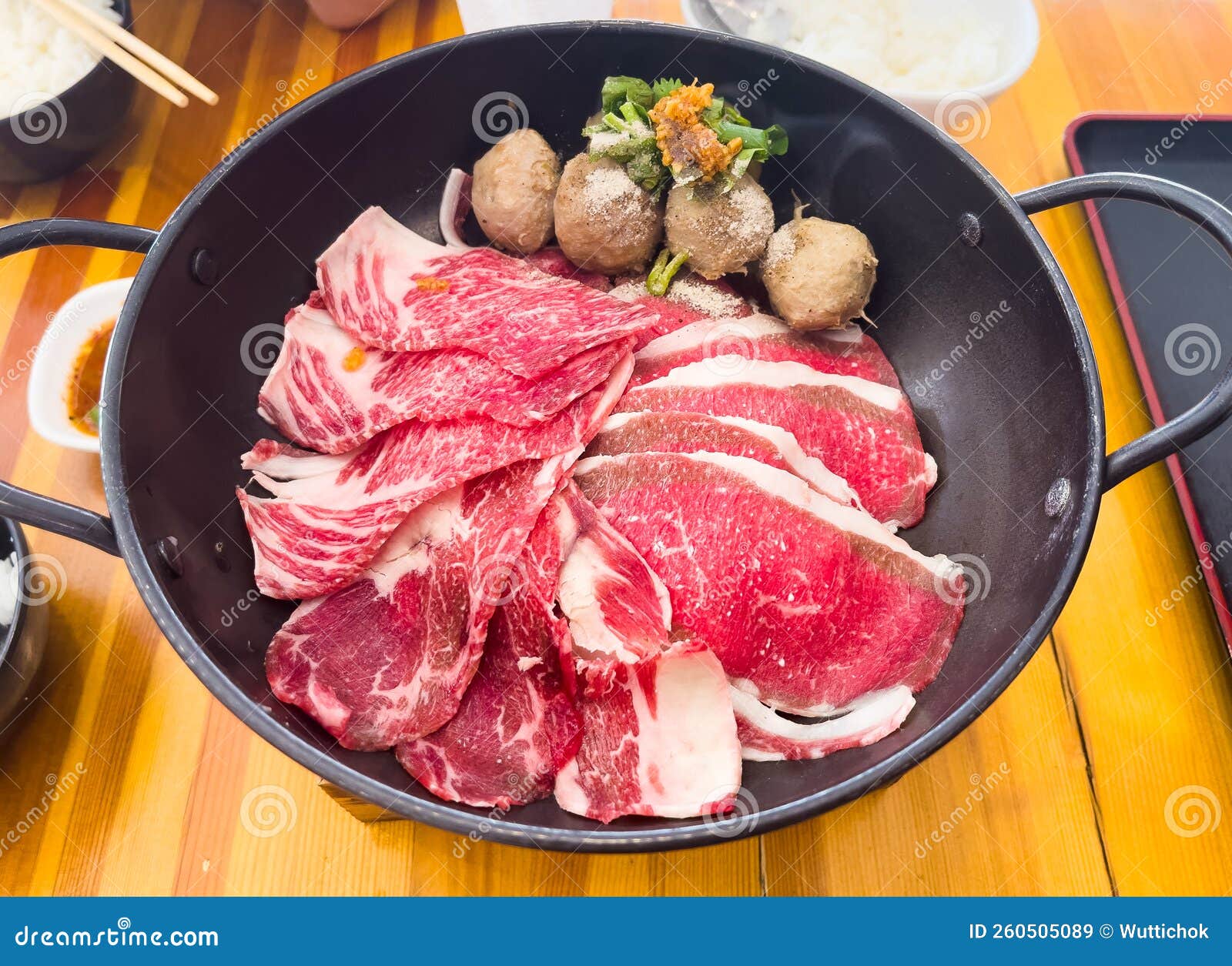 Fresh Beef Slice Serving in the Pan with Meatball and Some Vegetable ...
