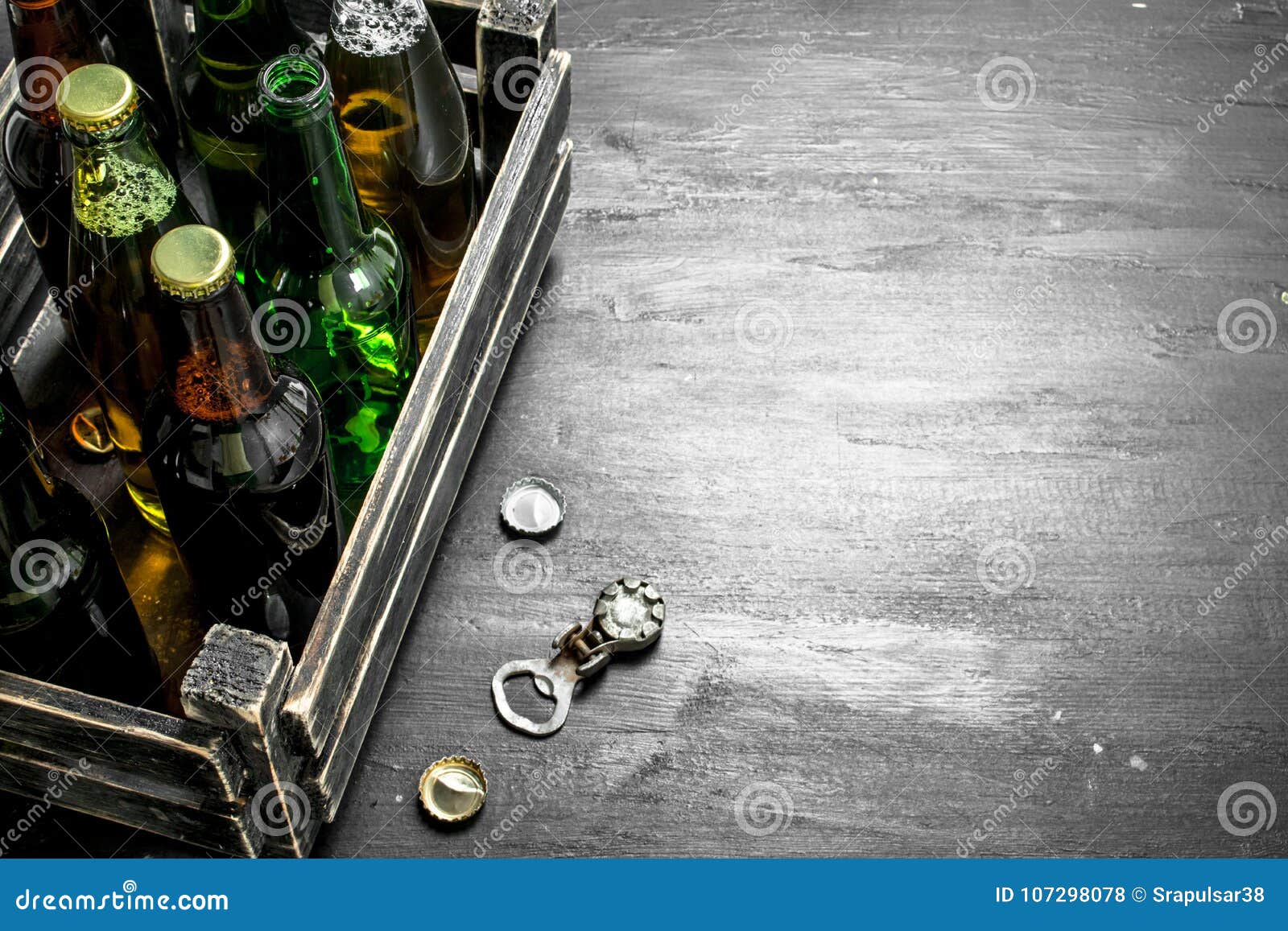 Fresh beer in an old box. stock photo. Image of golden - 107298078