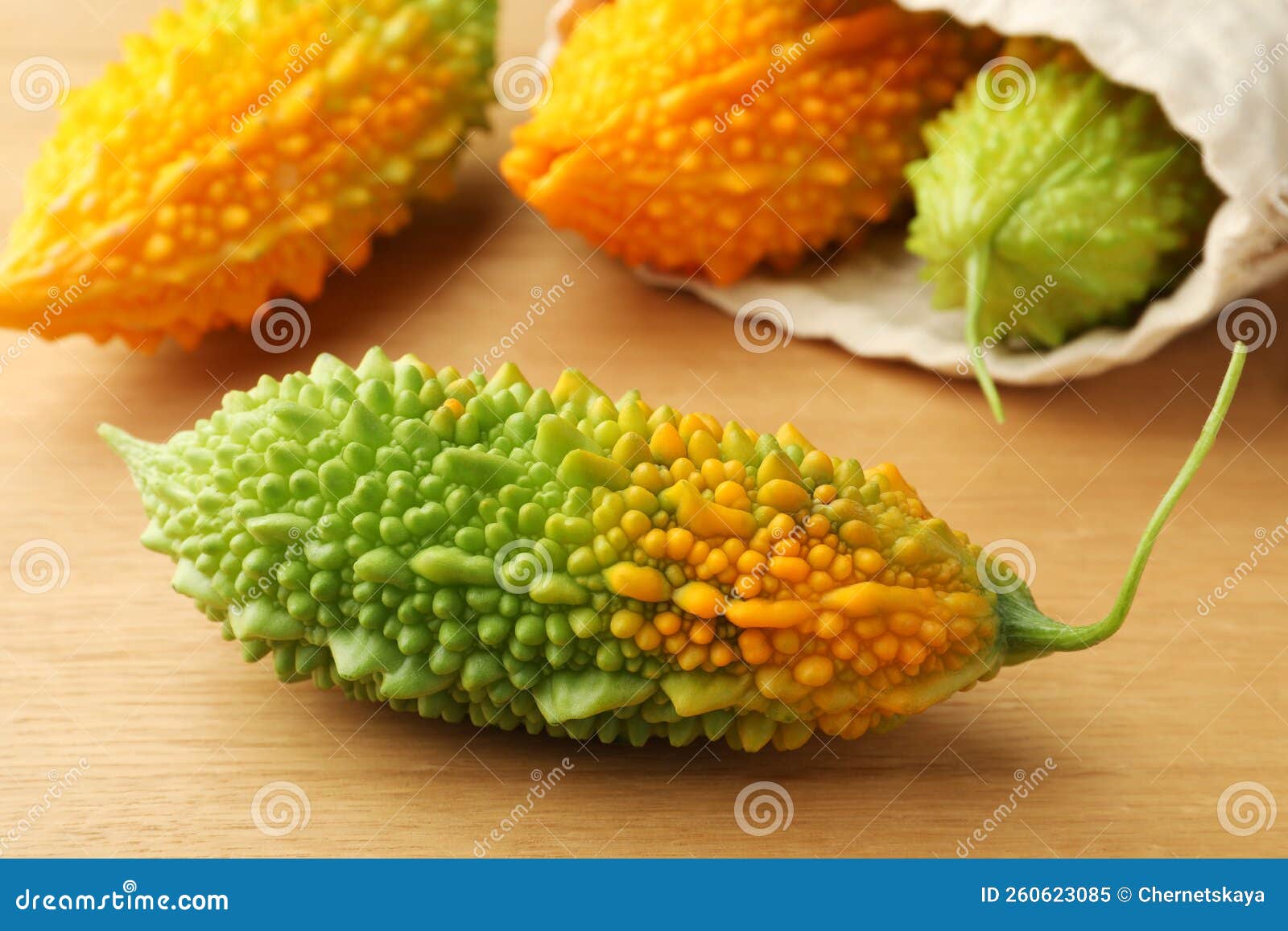 Fresh Bitter Melons on Wooden Table, Closeup Stock Image - Image of ...