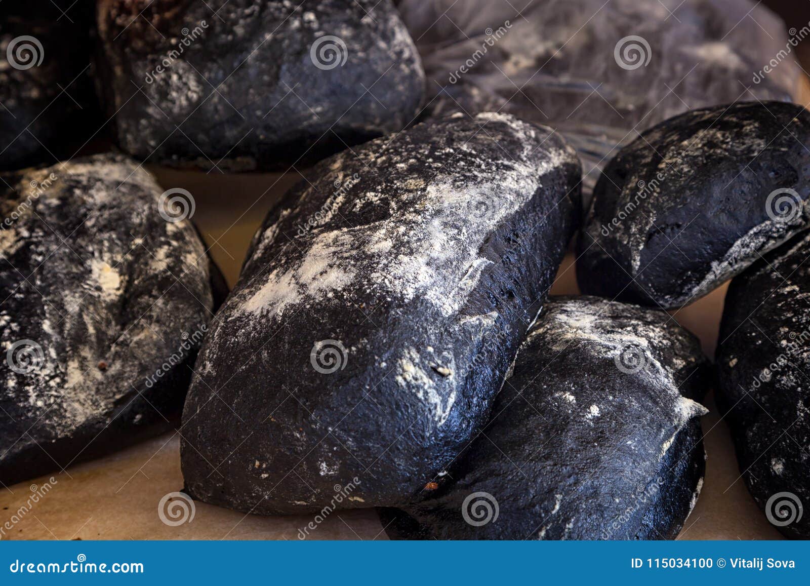 Fresh black bread stock photo. Image of flour, design - 115034100