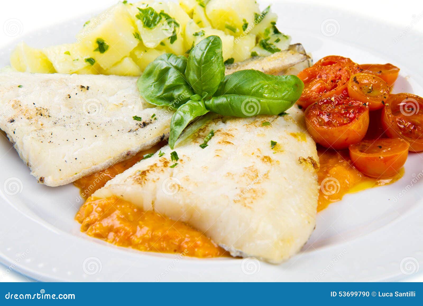 Fresh Black Cod with Potatoes and Tomatoes Sauce Stock Photo - Image of ...