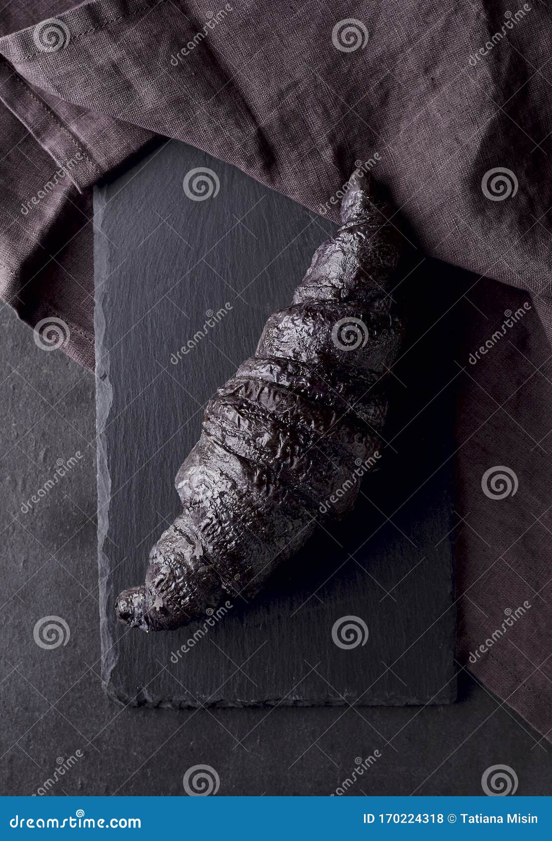 Fresh Black Croissant on a Black Board, Top View Stock Photo - Image of ...