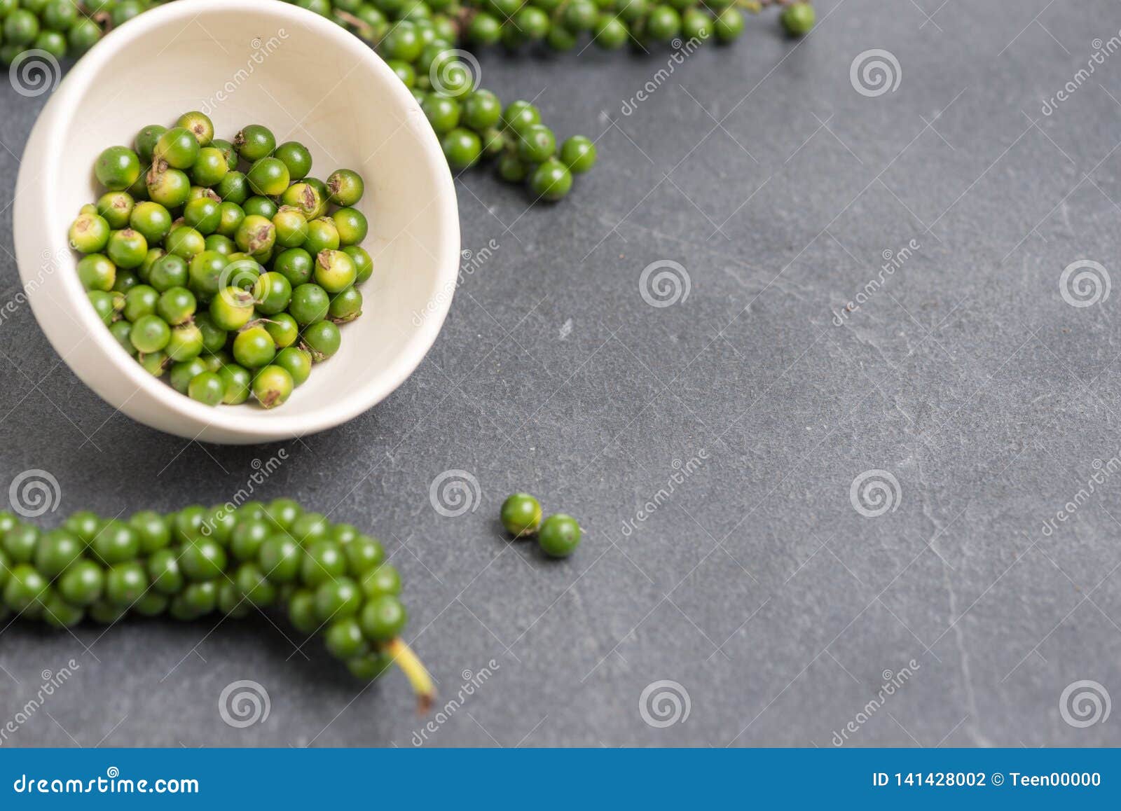Fresh Black Pepper on Rock Background Stock Photo - Image of border ...