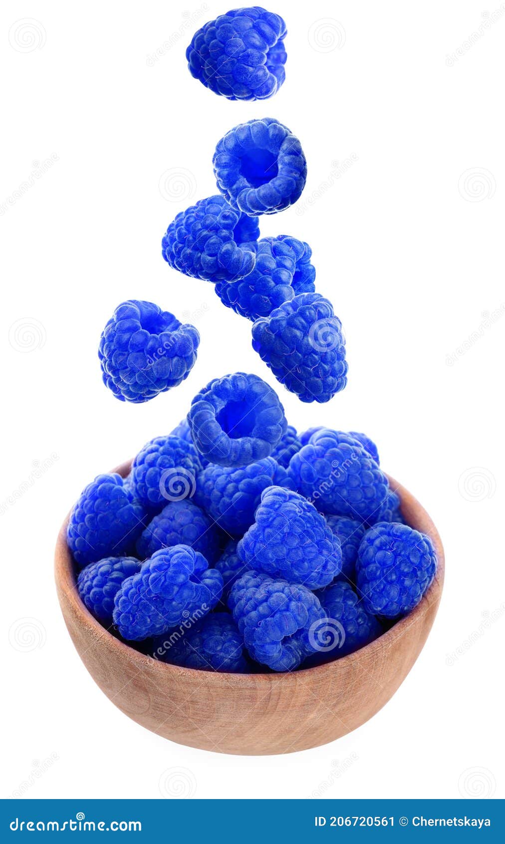 Fresh Blue Raspberries Falling into Bowl on White Background Stock ...