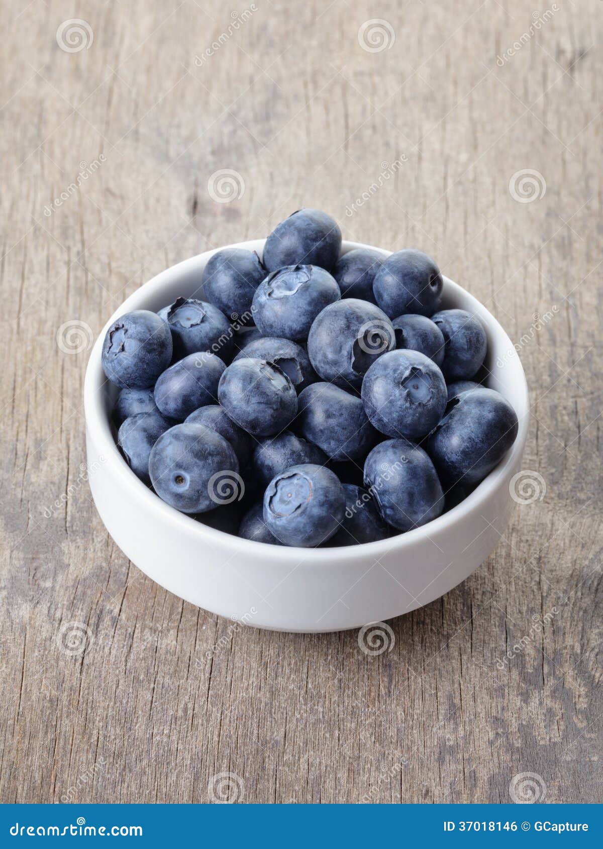 Fresh Blueberries in White Bowl on Wood Table Stock Photo - Image of ...