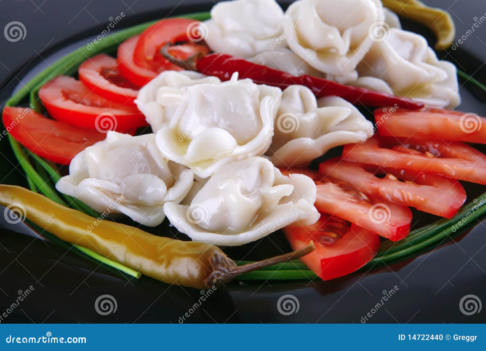 Fresh Boiled Dumplings on Black Stock Photo - Image of kitchen, knife ...