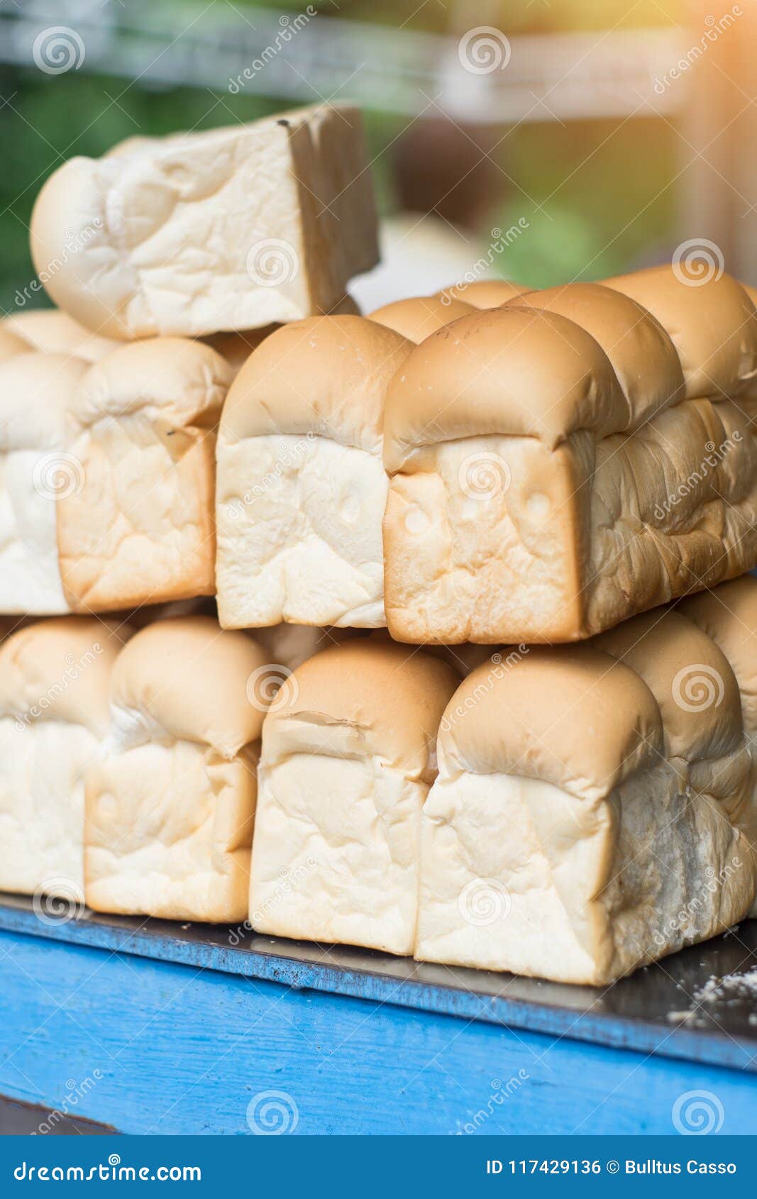 Fresh Bread stack on shelf stock photo. Image of concept - 117429136