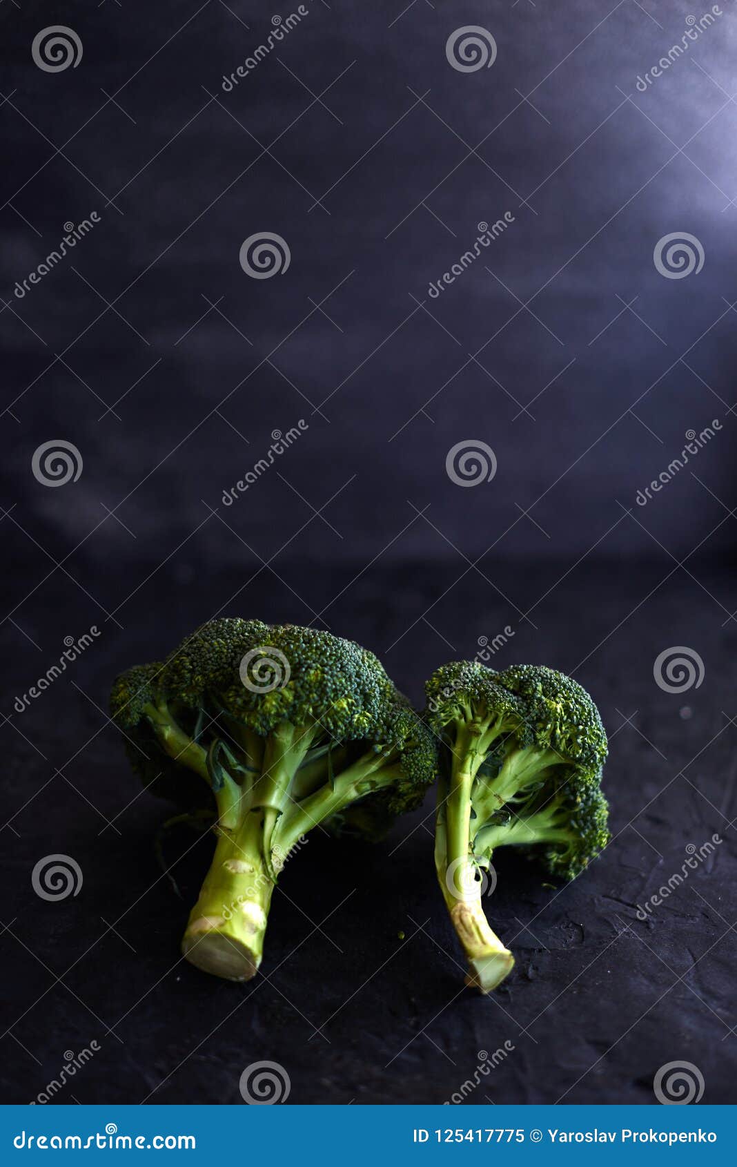 Fresh Brocoli on a Black Matte Background Stock Image - Image of board ...