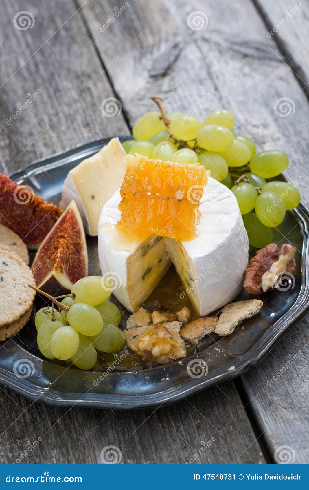 Fresh Camembert with Honey, Grapes and Crackers on Plate Stock Image ...