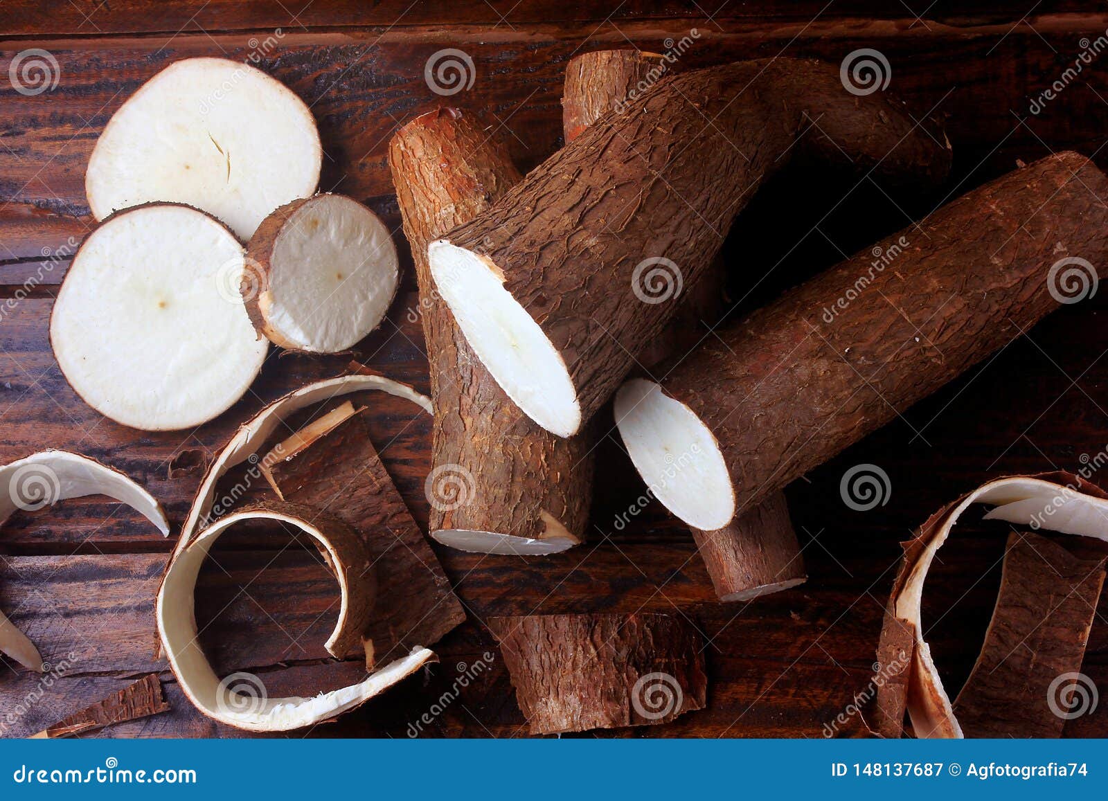 Fresh Cassava and Peels and Slices on Rustic Wooden Table Stock Image ...