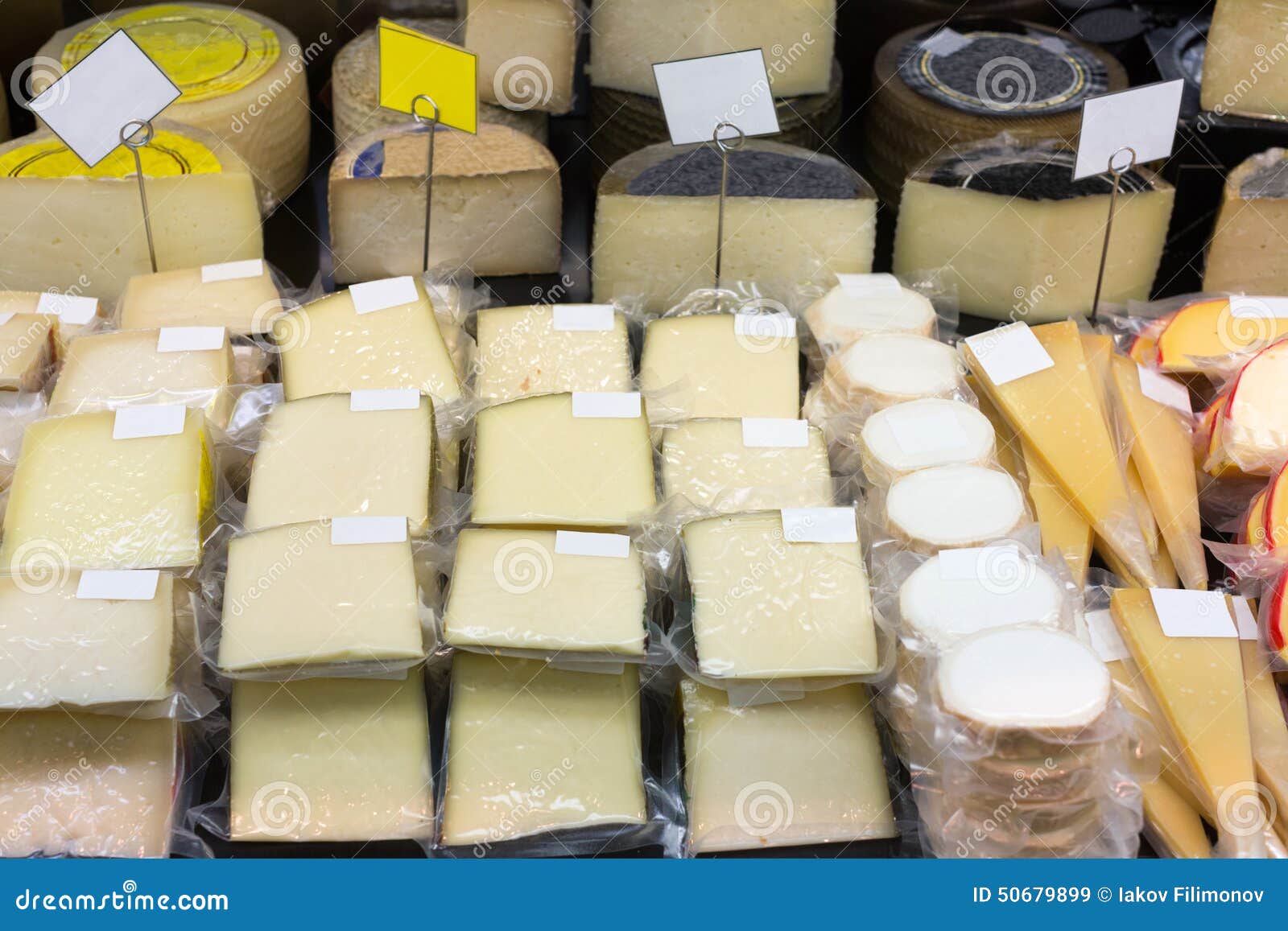 Fresh Cheese in Packs and in Bulk on Counter Stock Image - Image of ...