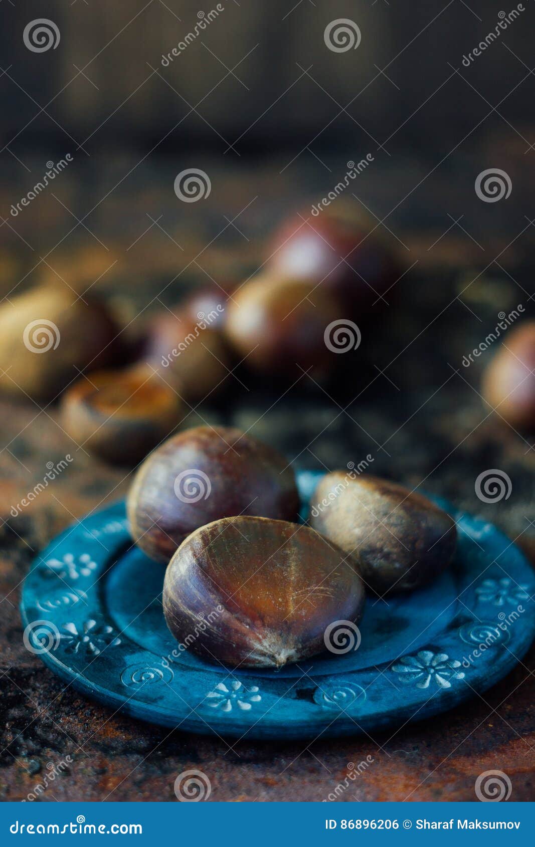 Fresh Chestnuts on Blue Plate Stock Photo - Image of wood, vegan: 86896206