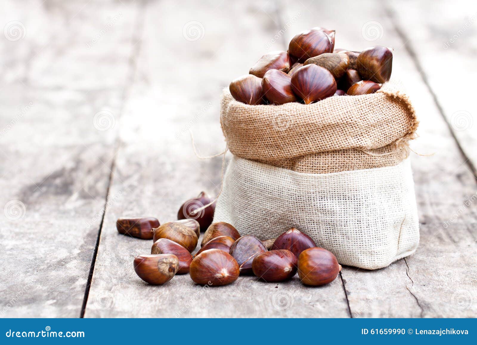 Fresh Chestnuts in Sack Bag on the Old Wooden Table Stock Photo - Image ...
