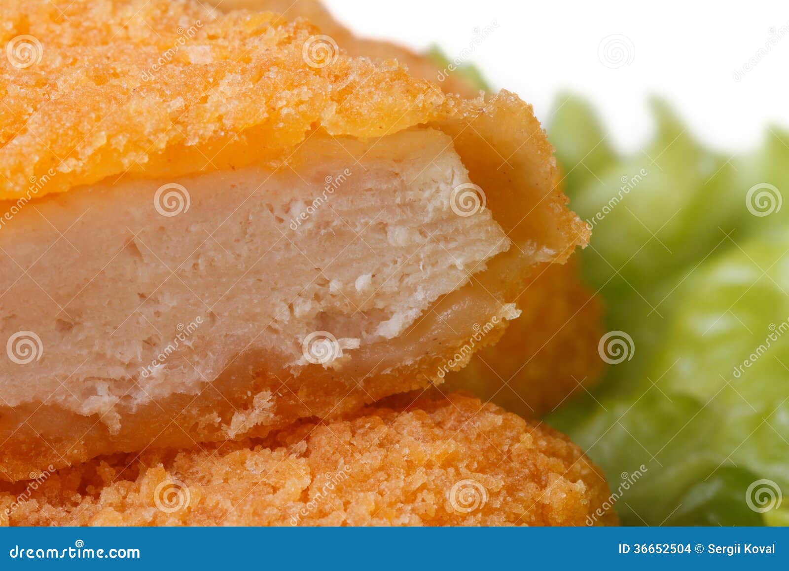 Fresh Chicken Nuggets Cut into Green Lettuce Close Up Stock Photo ...