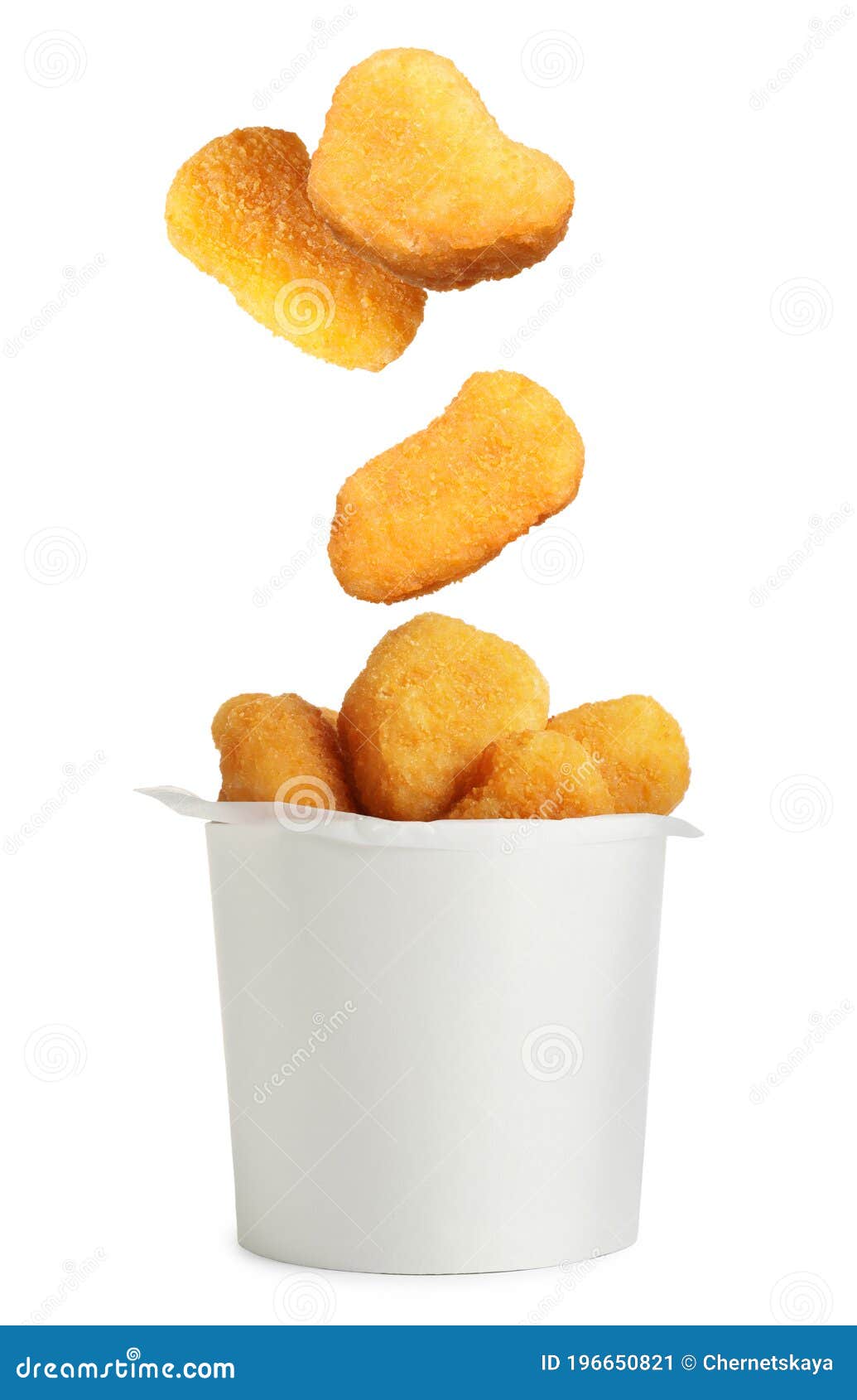Fresh Chicken Nuggets Falling into Container on White Background Stock ...
