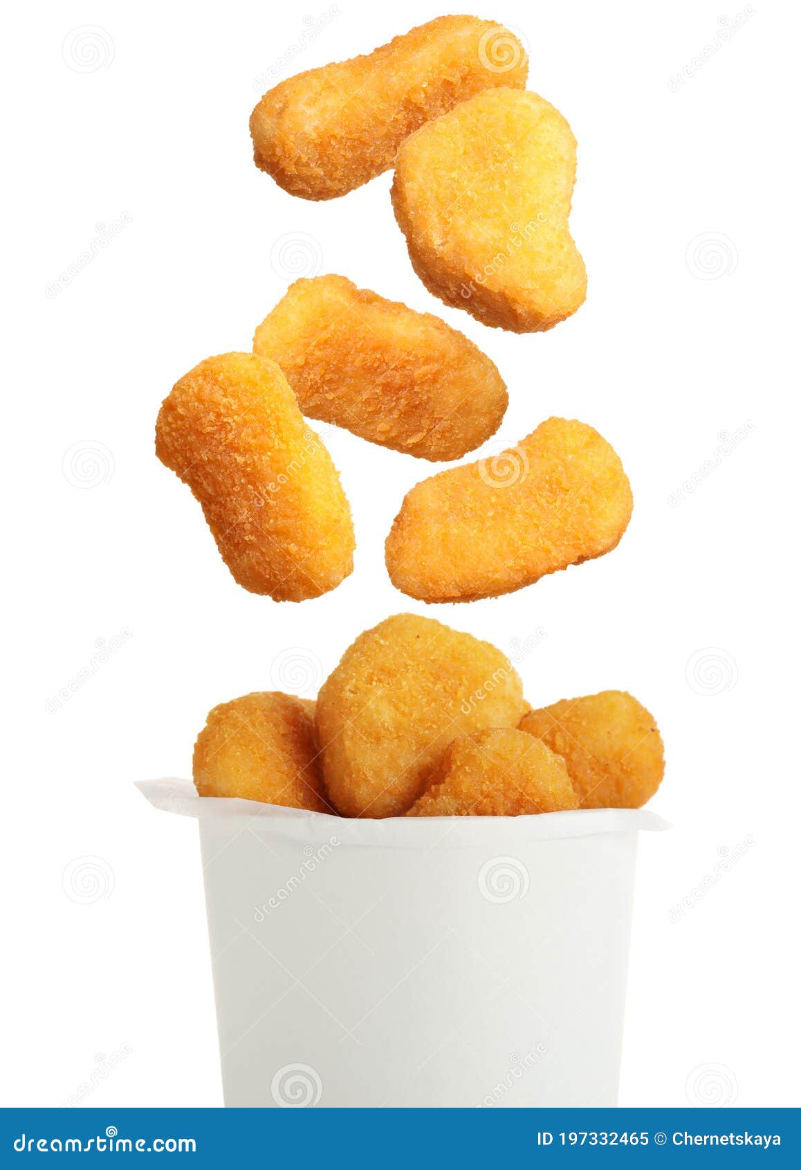 Fresh Chicken Nuggets Falling into Container on White Background Stock ...