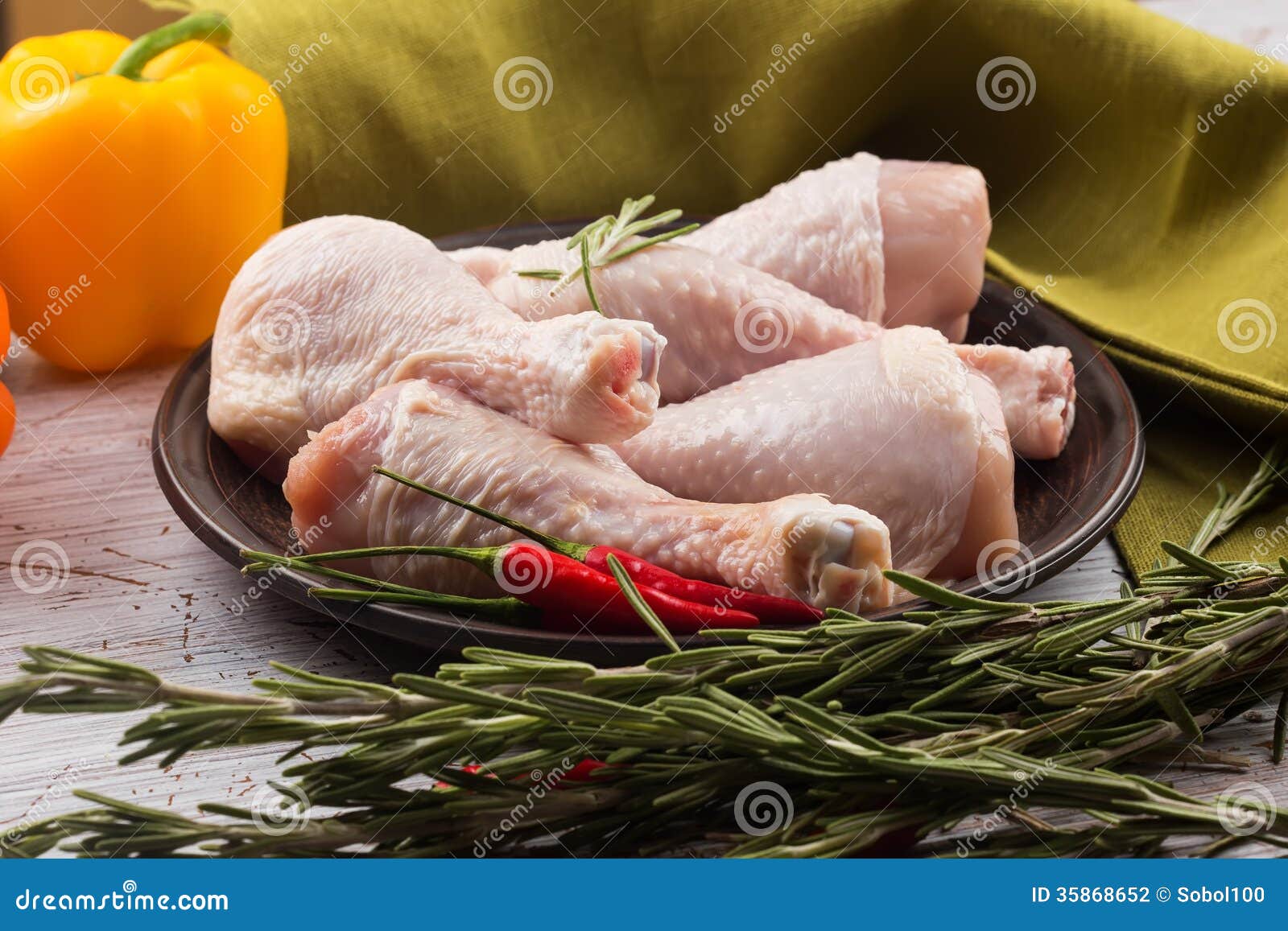 Fresh Chicken on Plate on Wooden Table Stock Photo - Image of meal ...