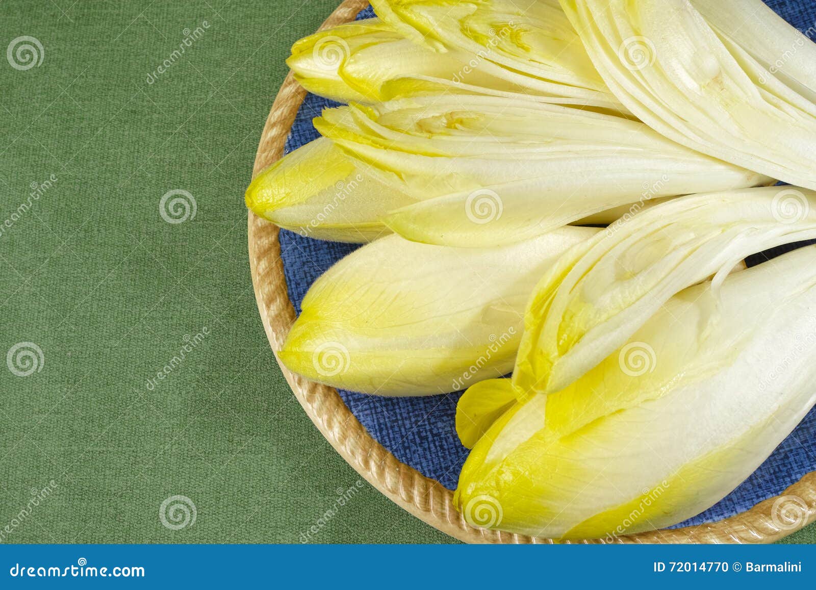 Fresh Chicory Salad Leaves Placed on a Blue Plate Stock Photo - Image ...