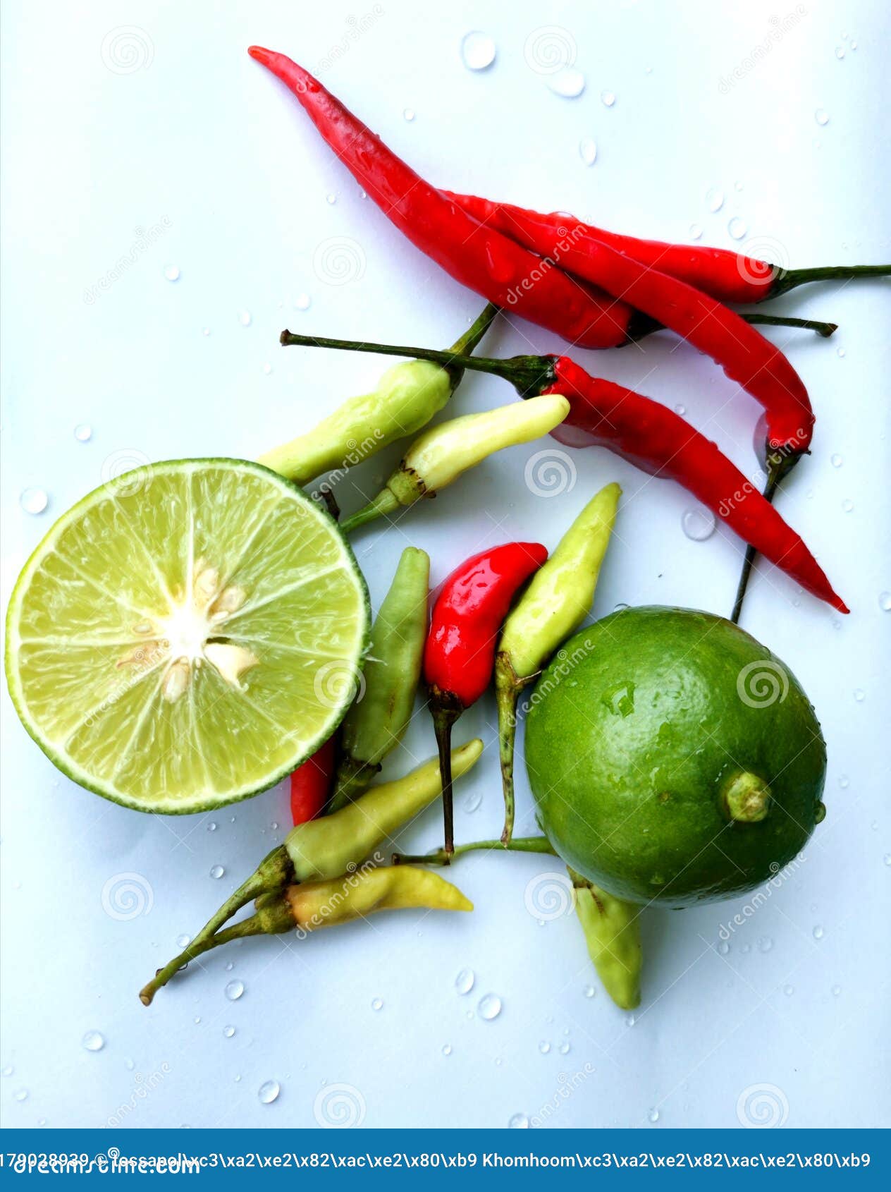 Fresh chilies with lemon stock image. Image of chilies - 179028939