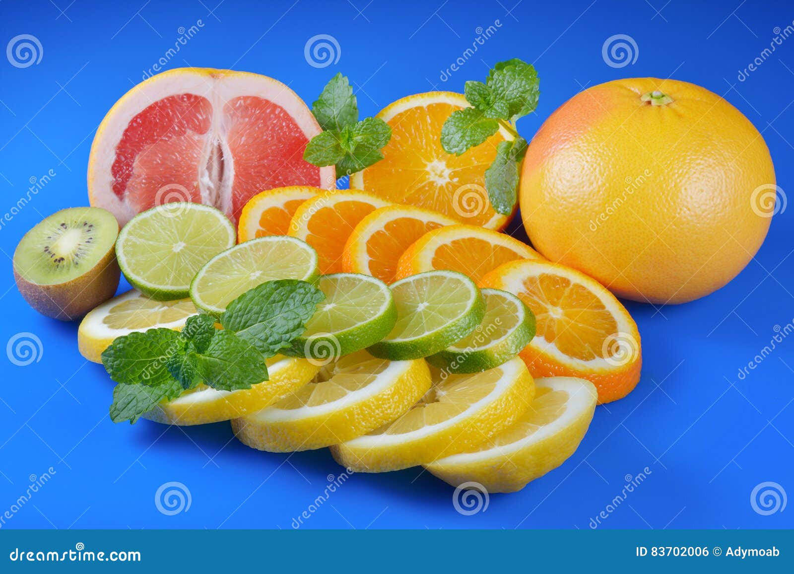 Fresh Citrus on Blue Background Stock Photo - Image of color, lemon ...