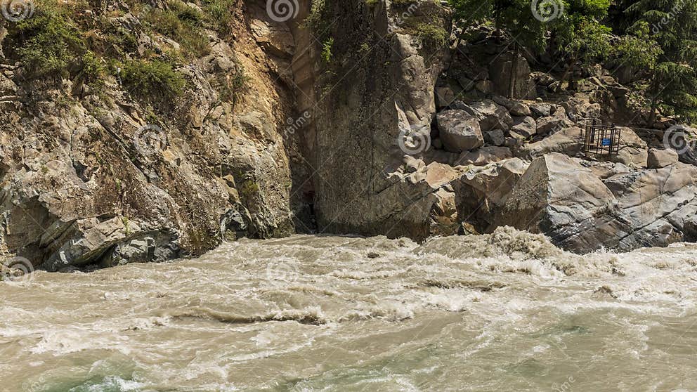 Fresh Clear Water from Flowing Along a Muddy Water in the River Stock ...