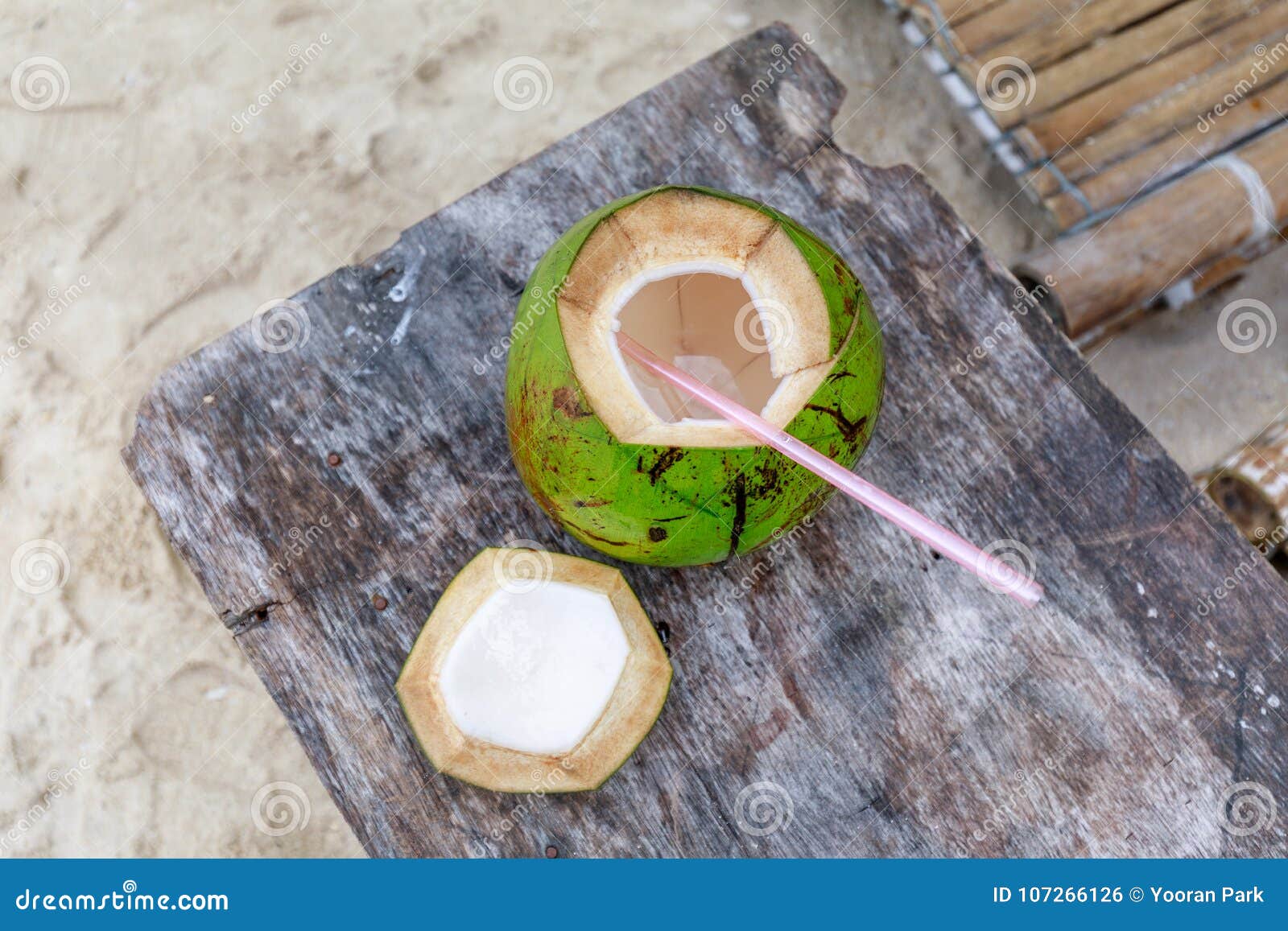 Fresh coconut with a straw stock photo. Image of diet - 107266126