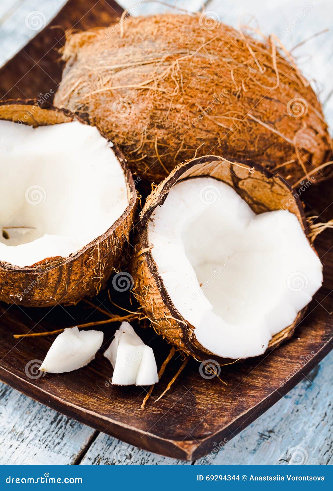 Fresh Coconuts in the Shell on a Blue Background Stock Photo - Image of ...