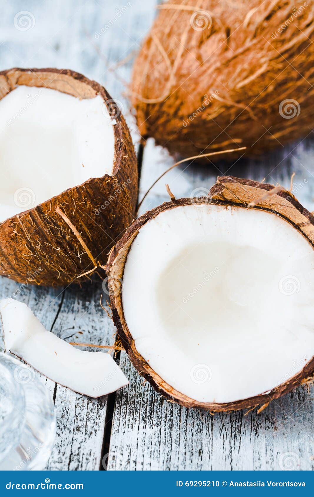 Fresh Coconuts in the Shell on a Blue Wooden Background Stock Photo ...