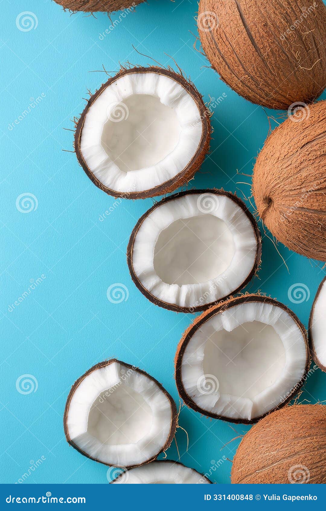 Fresh Coconuts Split Open on a Bright Blue Background with Coconut ...
