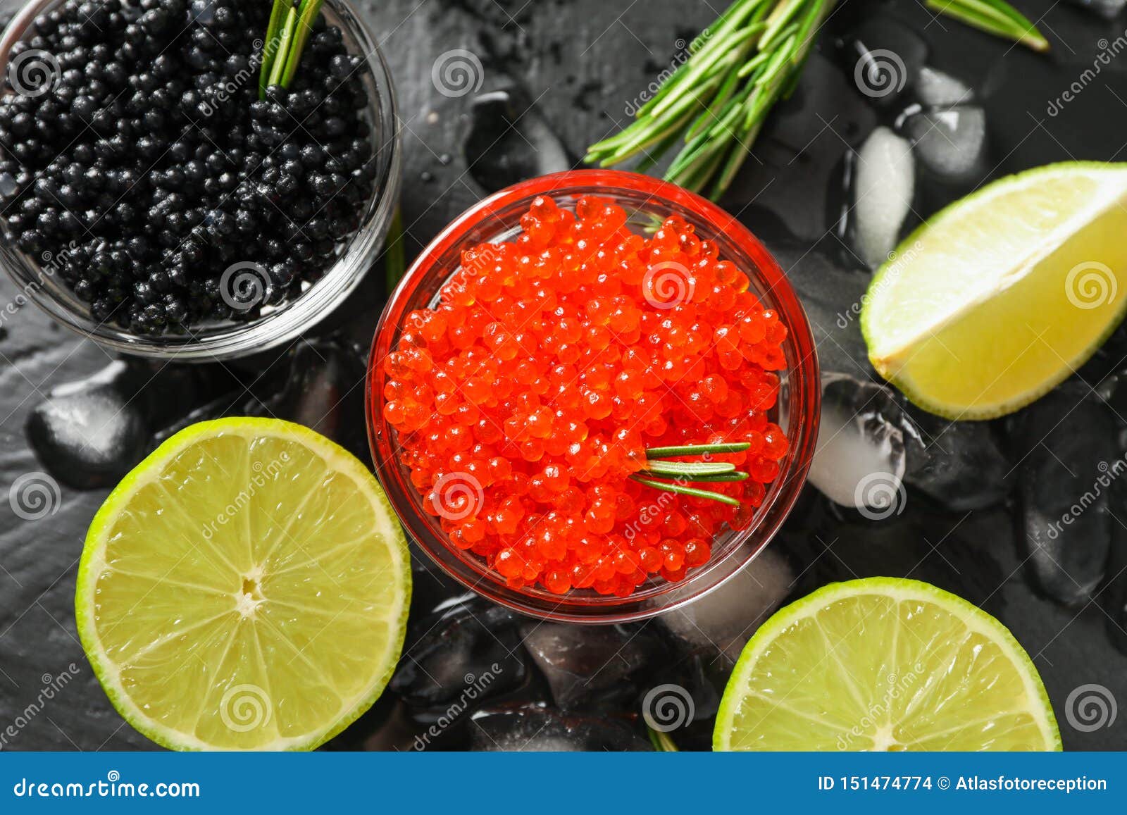Fresh Composition with Caviar and Citrus on Black Table Stock Photo ...