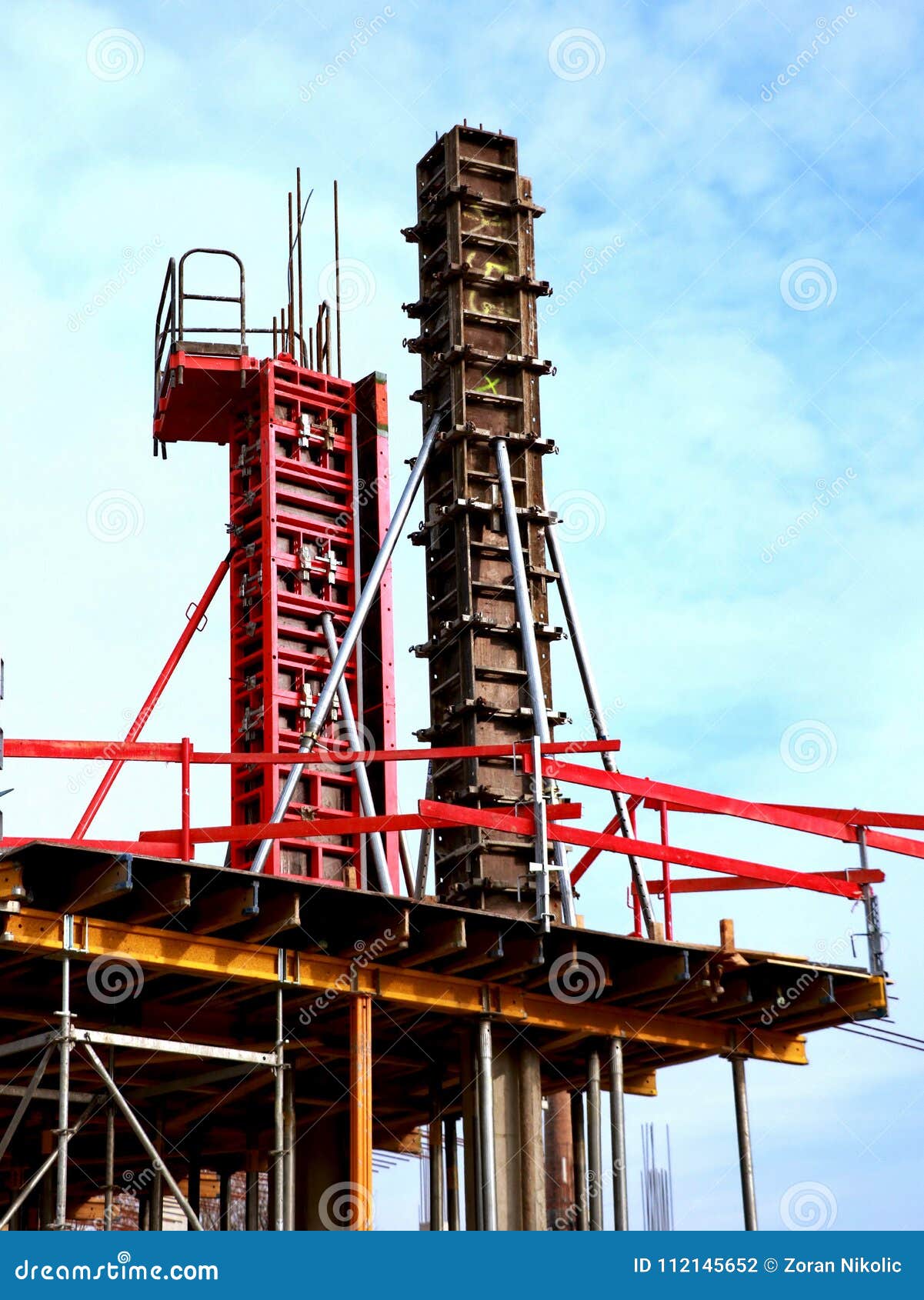Concrete Pillars with Reinforcement on the Construction Site Stock ...
