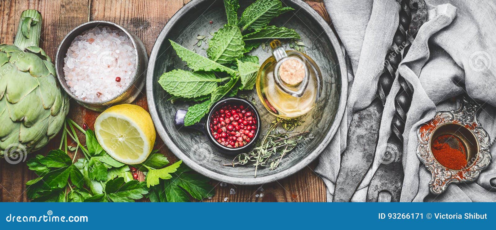 Fresh Condiment and Seasoning Setting on Rustic Kitchen Table ...