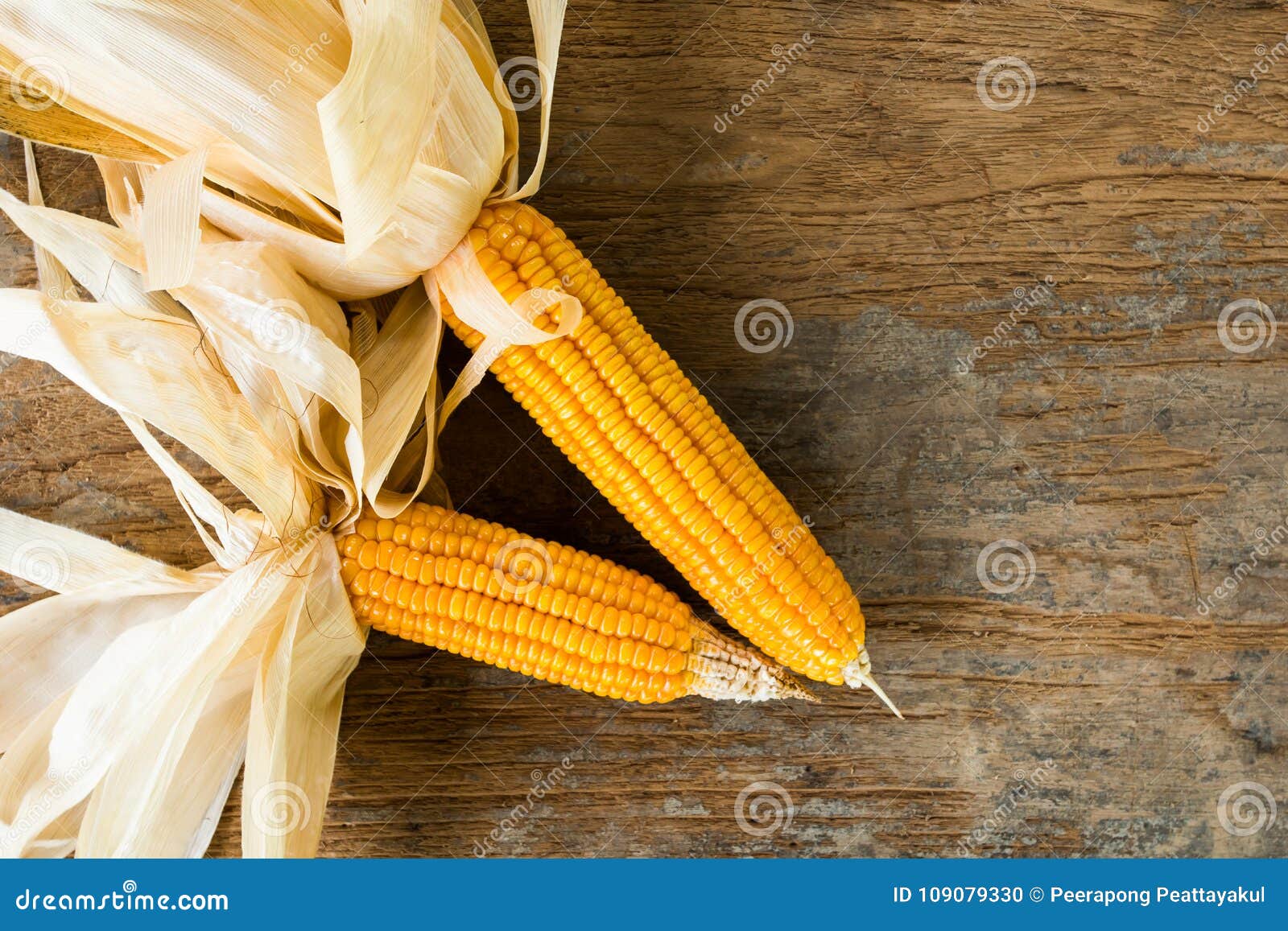 Fresh Corn on Cobs on Rustic Wooden Table, Closeup. Stock Photo - Image ...