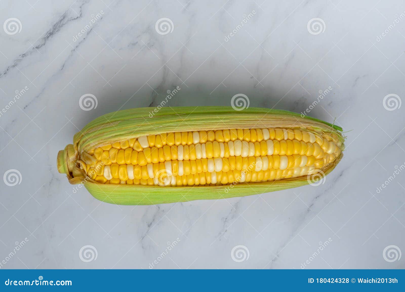 Fresh Corn Ears with Leaves Isolated on White Marble Background. Top ...