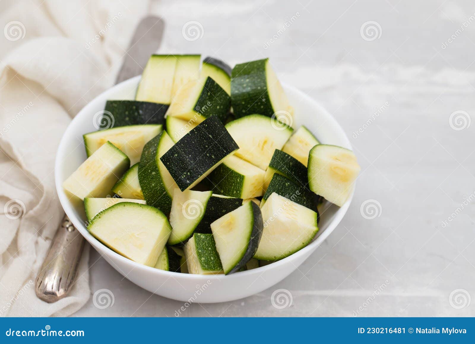 Fresh Courgette in Cubes in Small White Bowl Stock Image - Image of ...